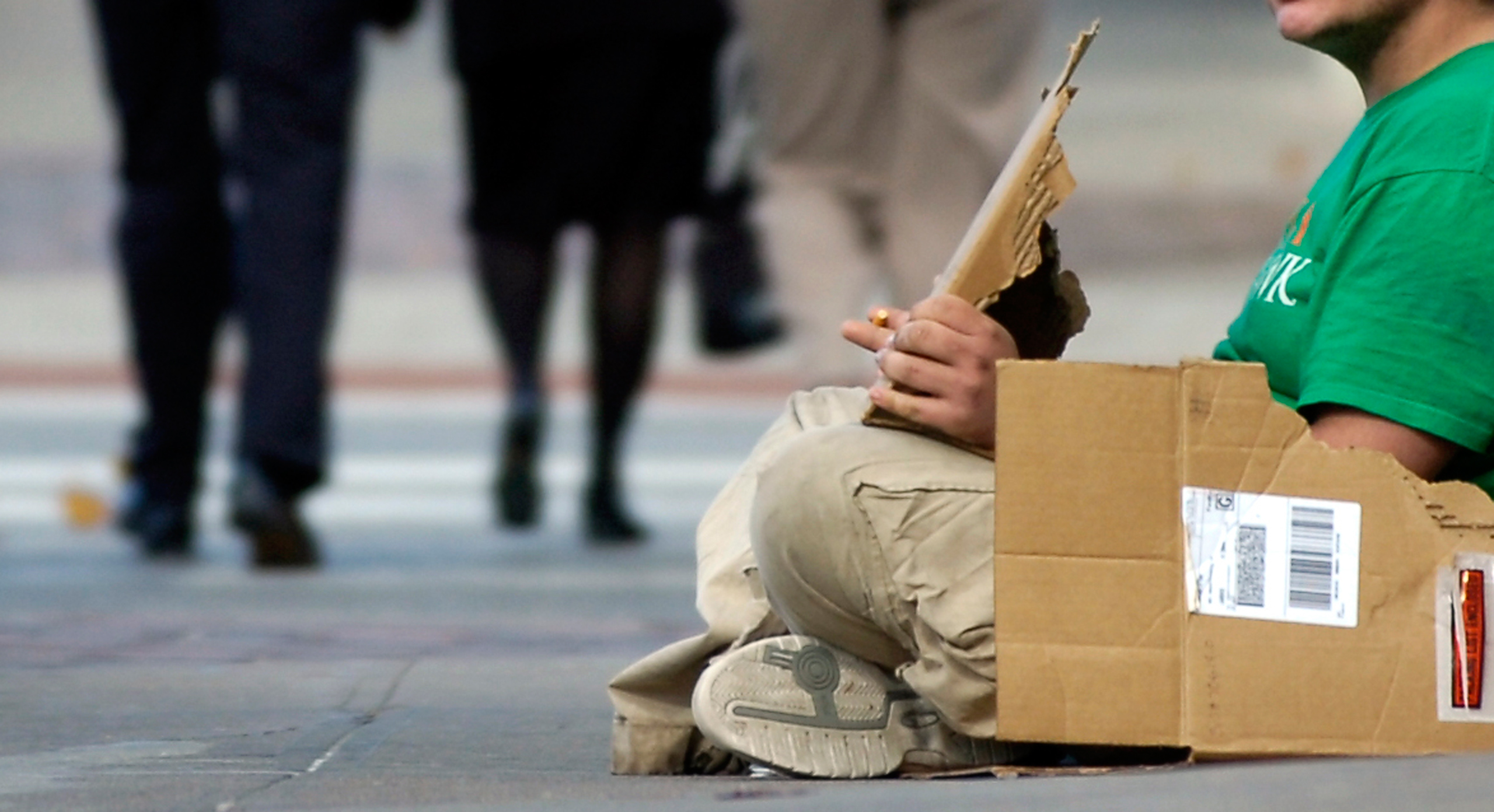 Some say panhandling is hurting downtown Lawrence businesses; city may ...